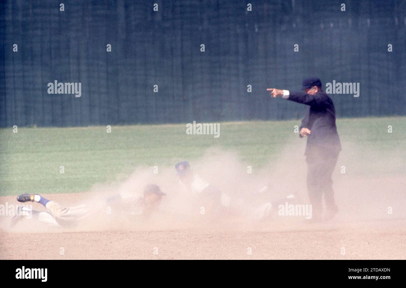 APRIL, 1962: Elder White #19 of the Chicago Cubs puts the tag on Willie ...