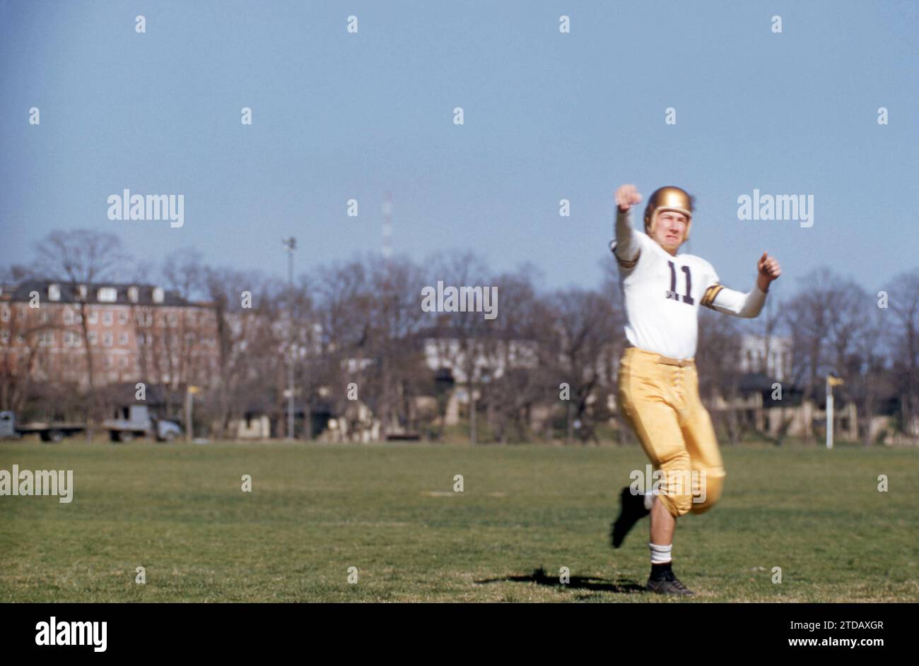 ANNAPOLIS, MD - MARCH, 1955: Quarterback George Welsh #11 of the Navy ...
