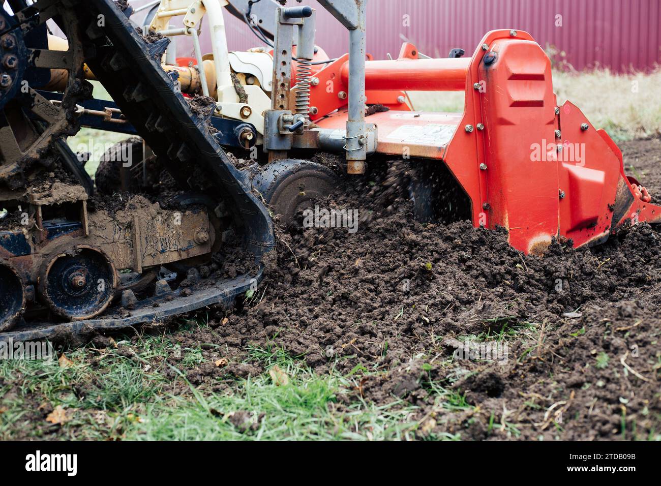 crawler tractor plunged the cutter into the ground for loosening and ...