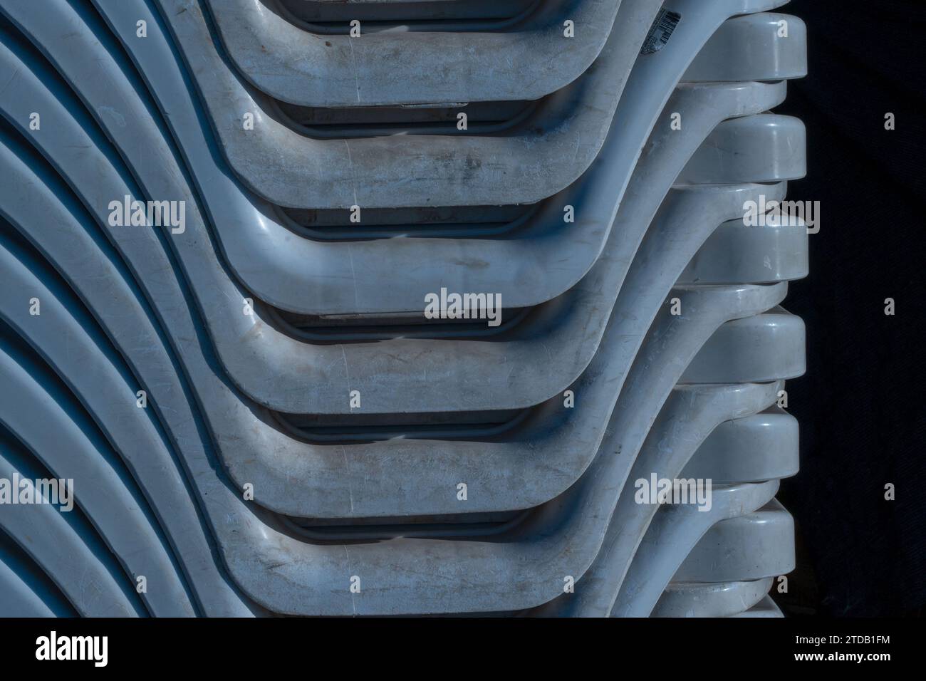 Sun lounges deck chairs, stacked together, end of summer season. Ohrid Macedonia 2023 Stock ...
