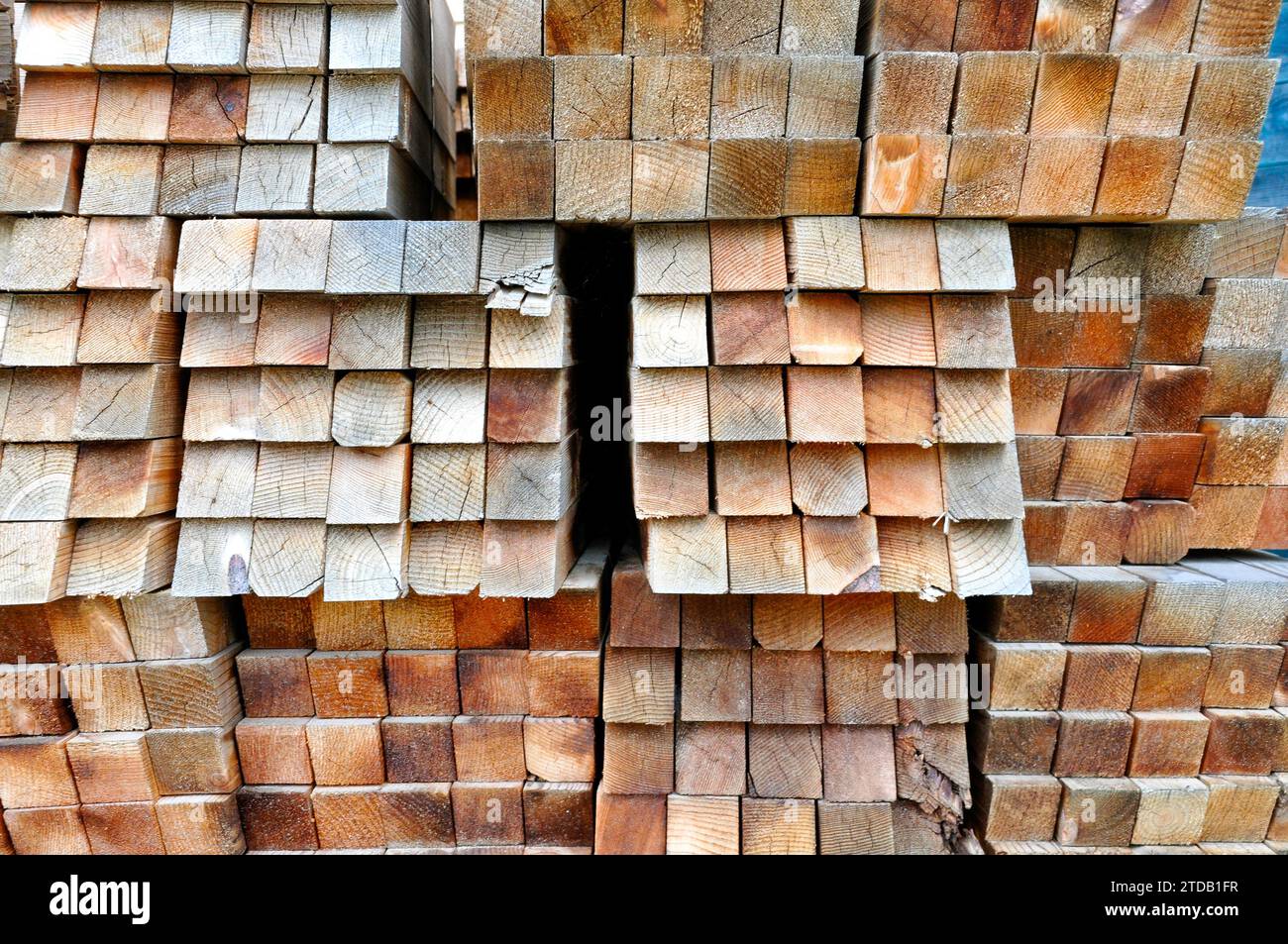 Abstract wood background of cut lumber building materials used in ...
