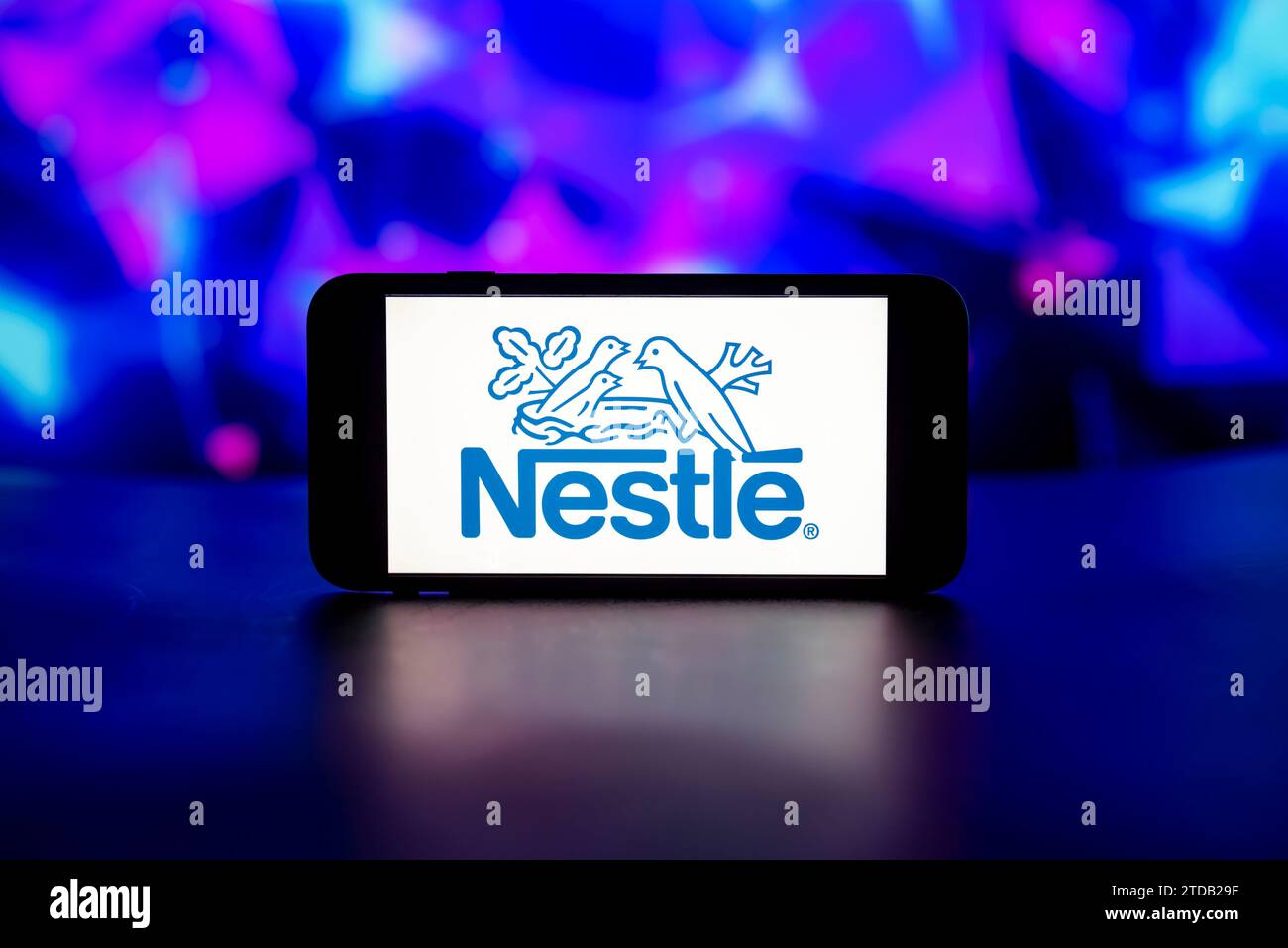 In this photo illustration, the Nestle logo is seen displayed on a ...