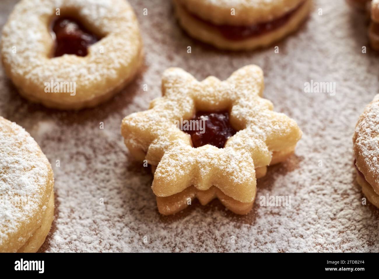 Linzer Christmas cookie in the shape of a star, filled with red ...