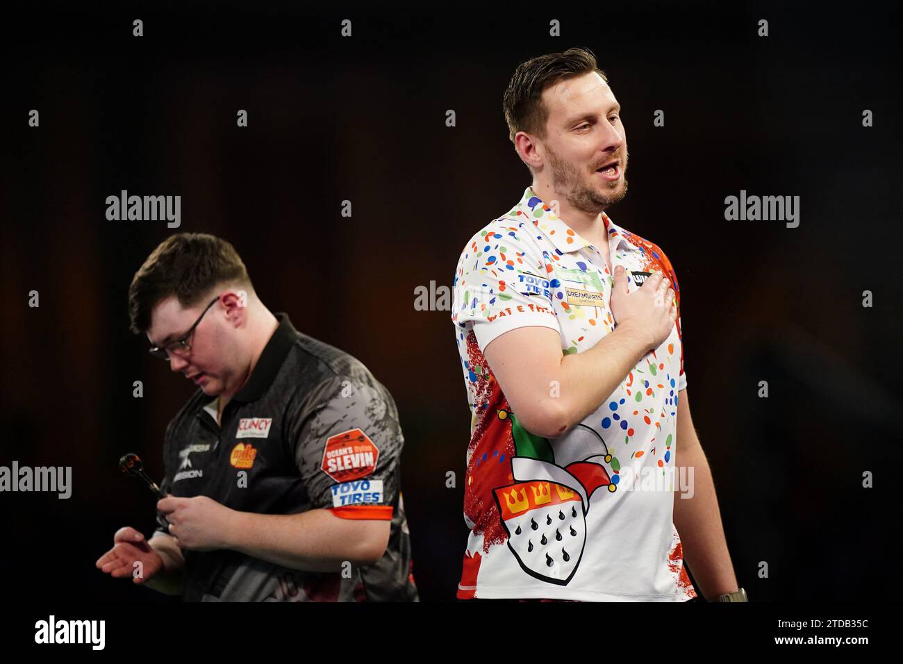 Dylan Slevin reacts after victory over Florian Hempel (left) on day ...