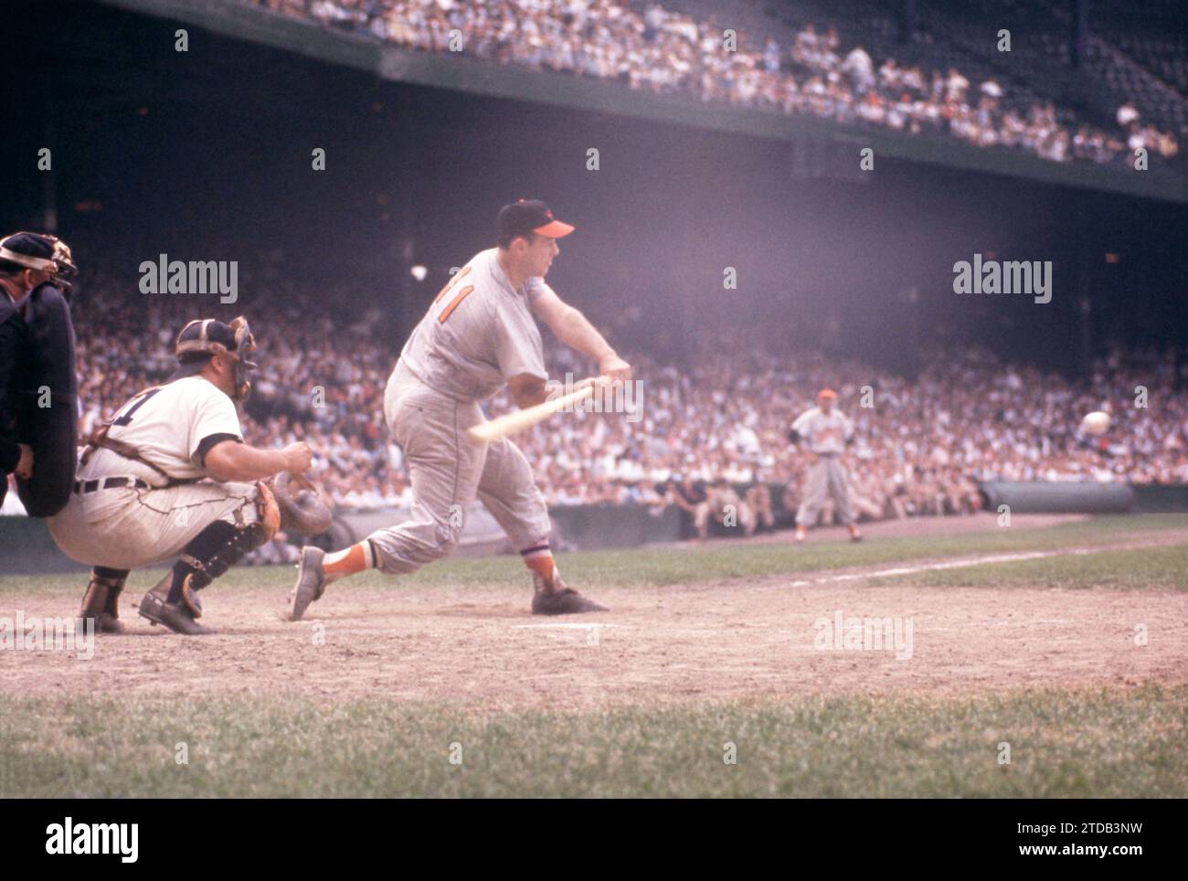 DETROIT, MI - JUNE 28: Gus Triandos #11 of the Baltimore Orioles swings ...