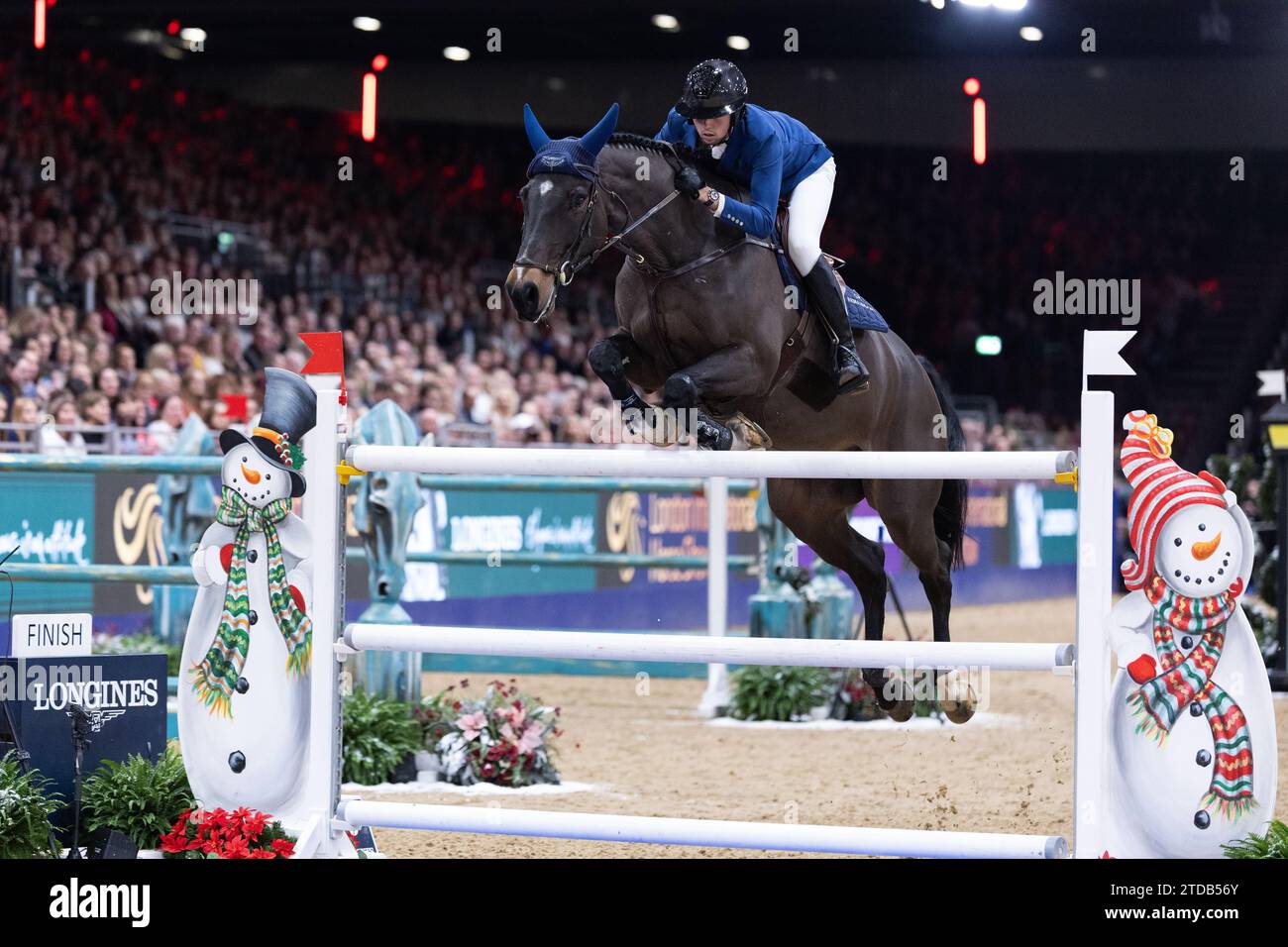 London, UK. December 17, 2023. Martin Fuchs of Switzerland with Conner ...