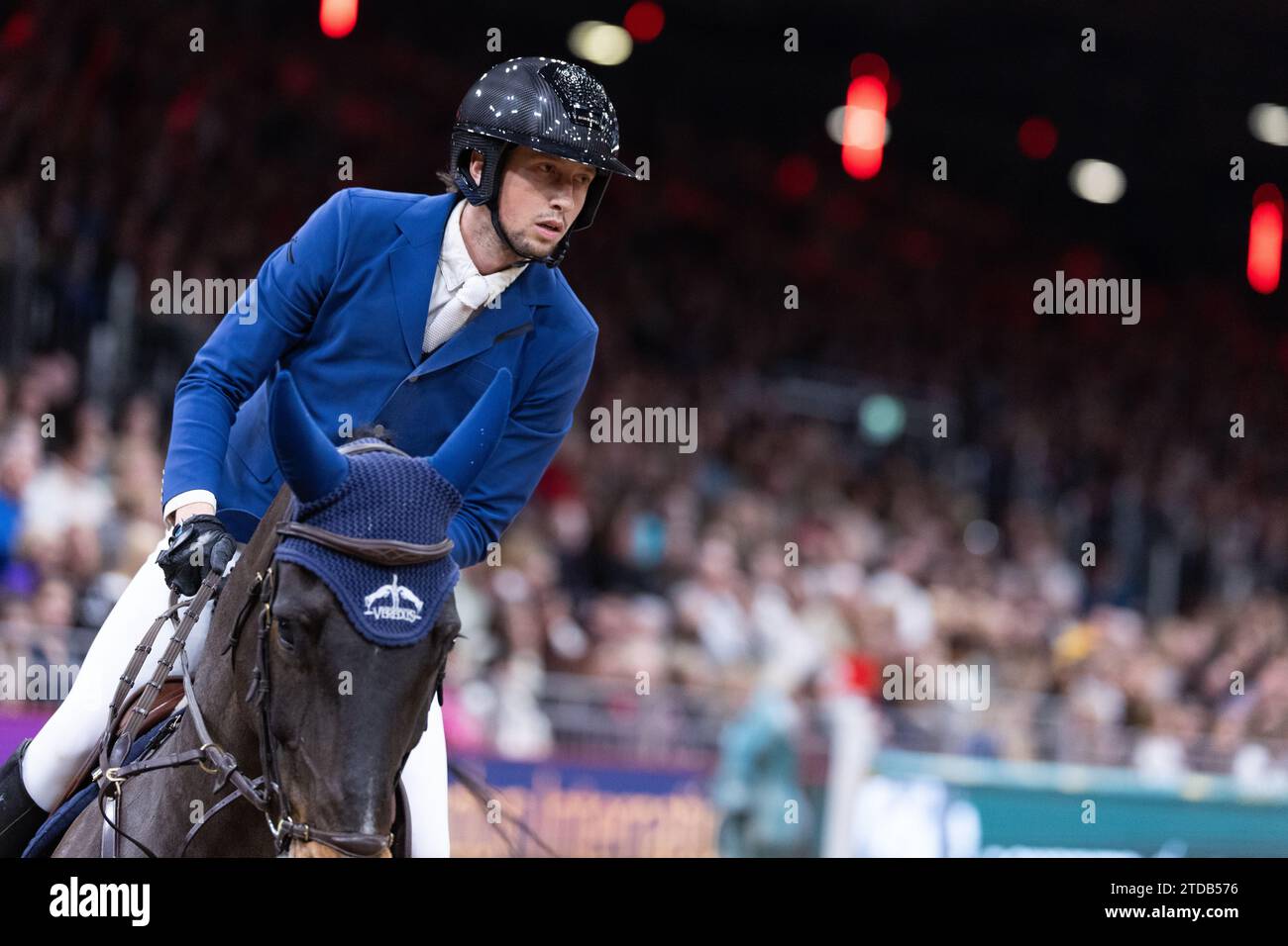 London, UK. December 17, 2023. Martin Fuchs of Switzerland with Conner ...