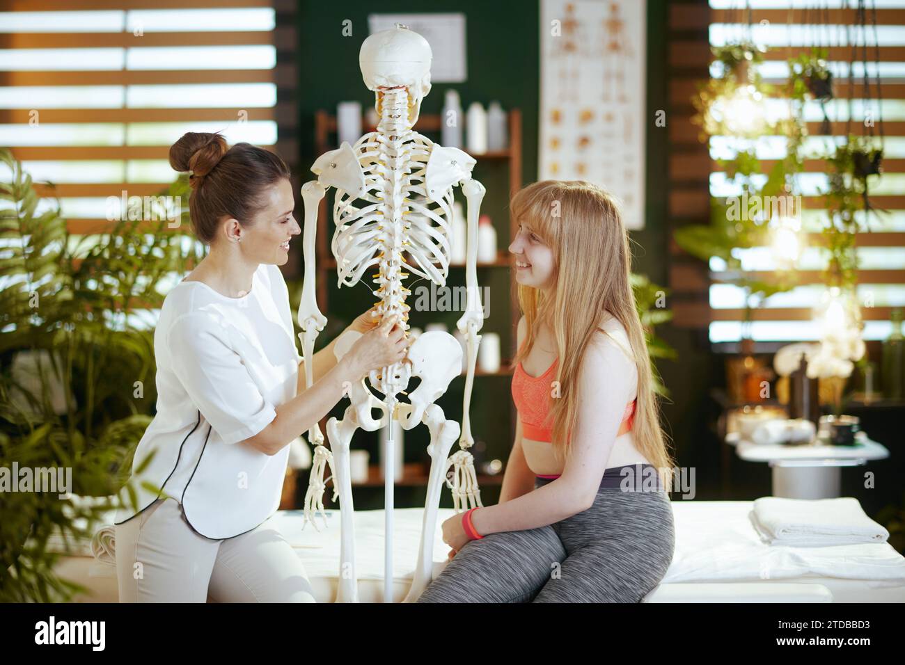 Healthcare Time Happy Female Medical Massage Therapist In Massage