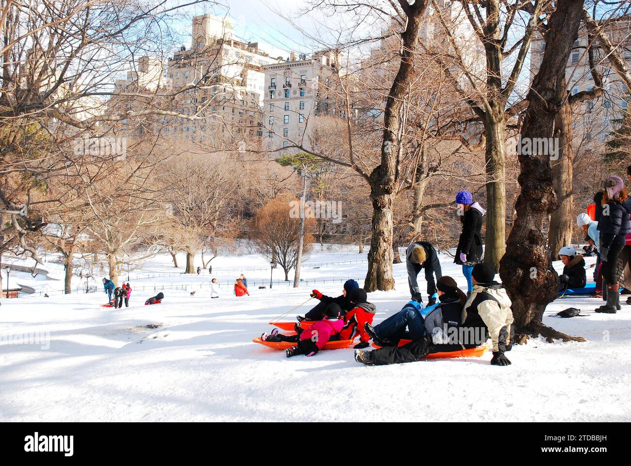Folks enjoy a snow day sledding on a hill in New York’s Central Park in ...