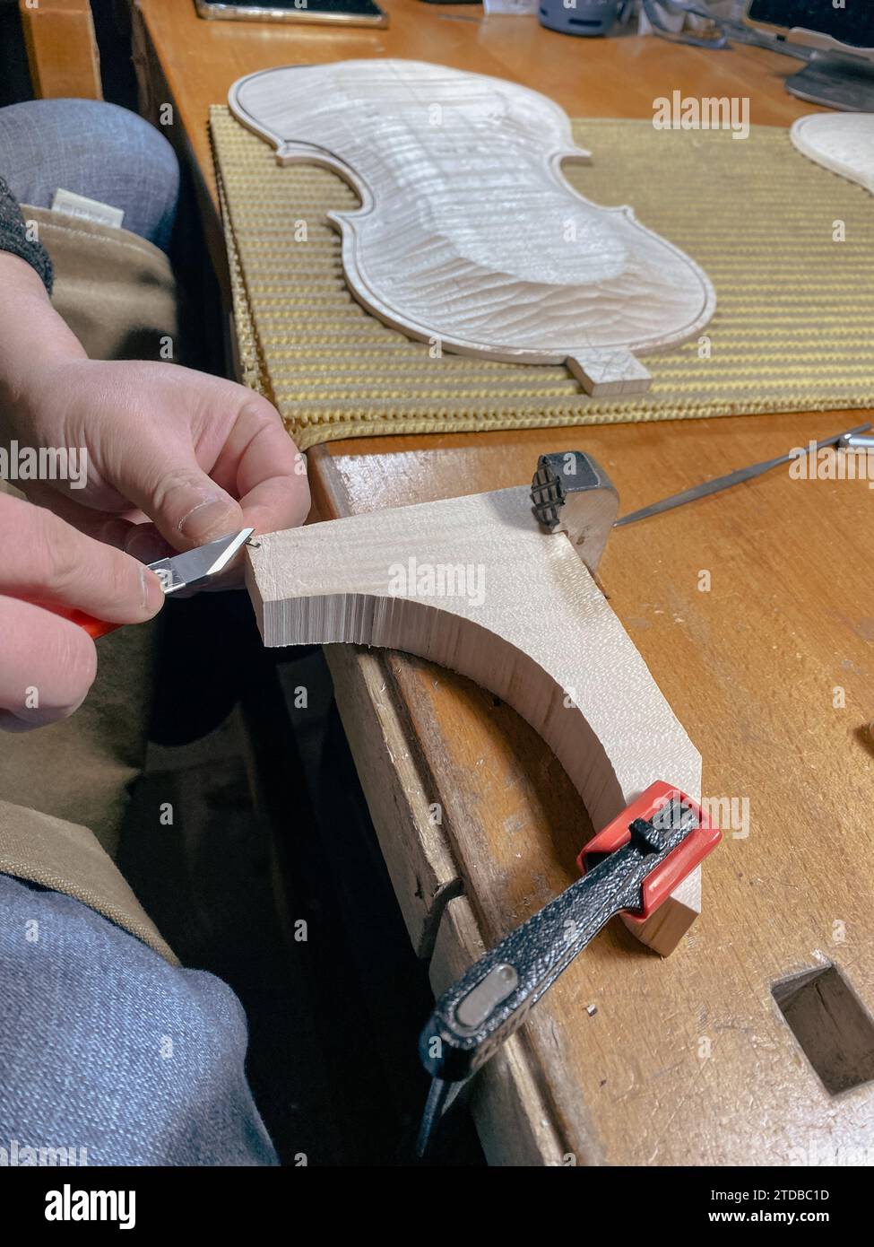violin maker artisan cutting fillet purfling with tool to join other ...
