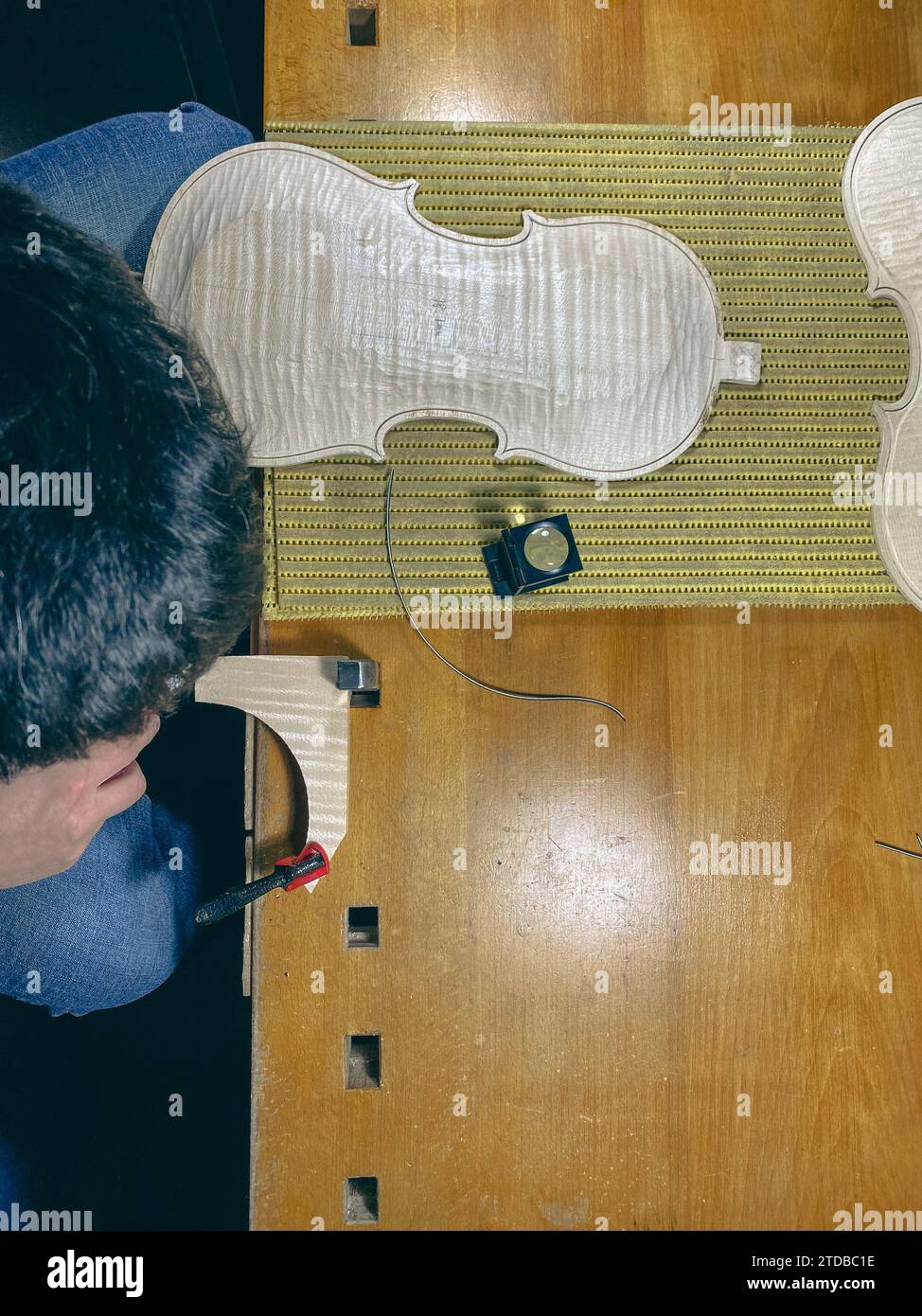 violin maker artisan cutting fillet purfling with tool to join other ...
