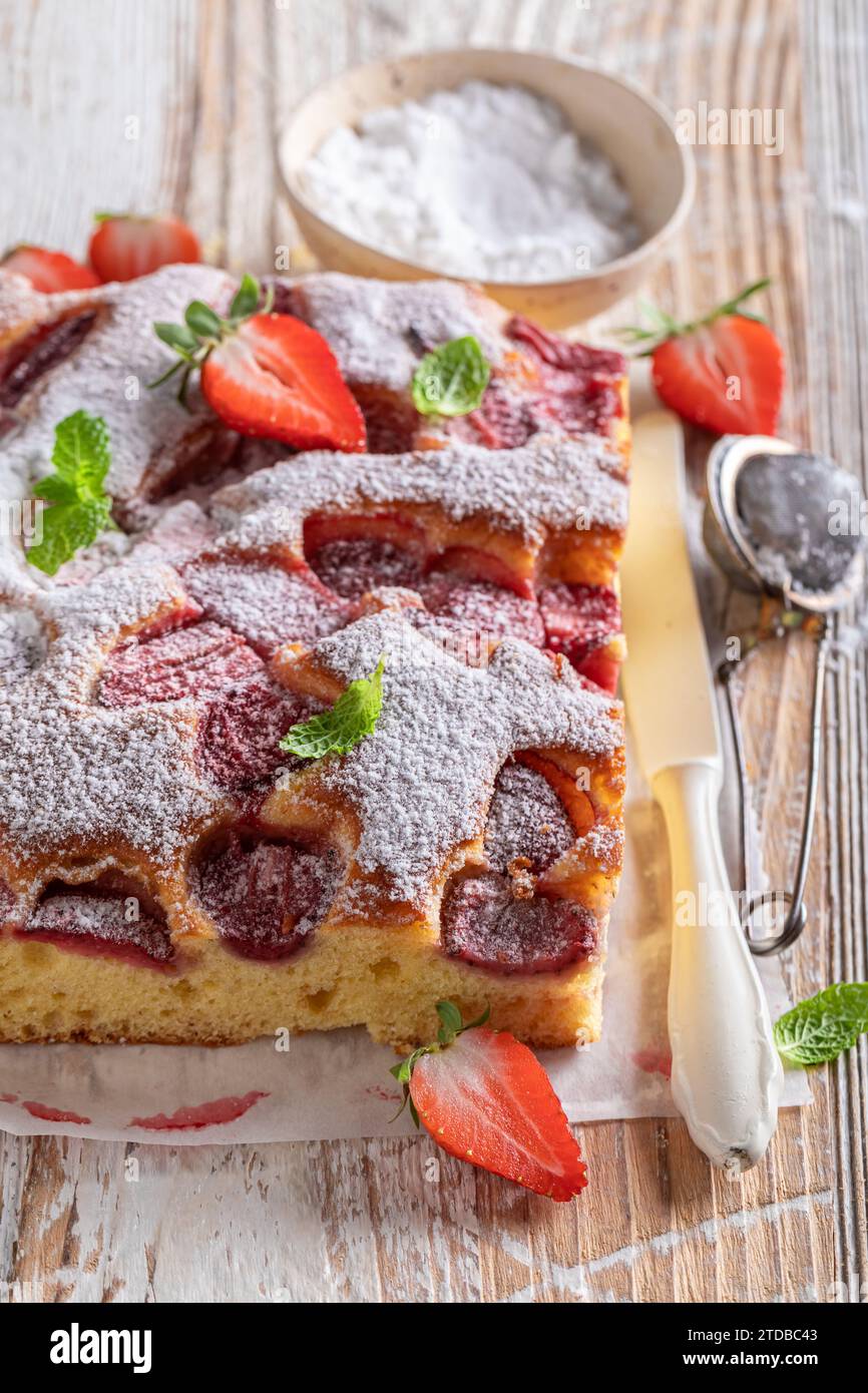Homemade strawberry sponge cake with fruits and jelly. Homemade sponge ...