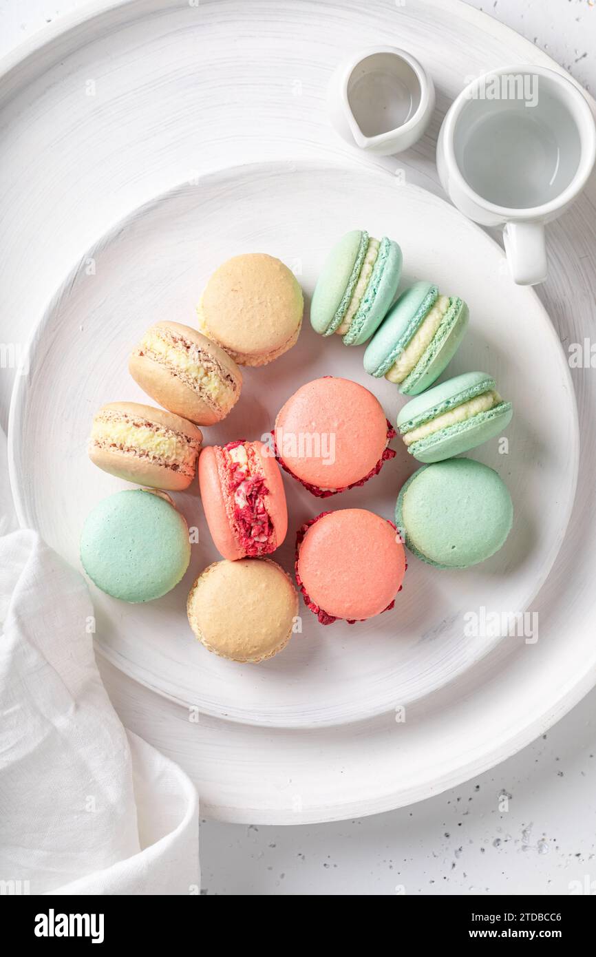 Colorful and tasty macaroons made of fresh fruits and cream. Colorful ...