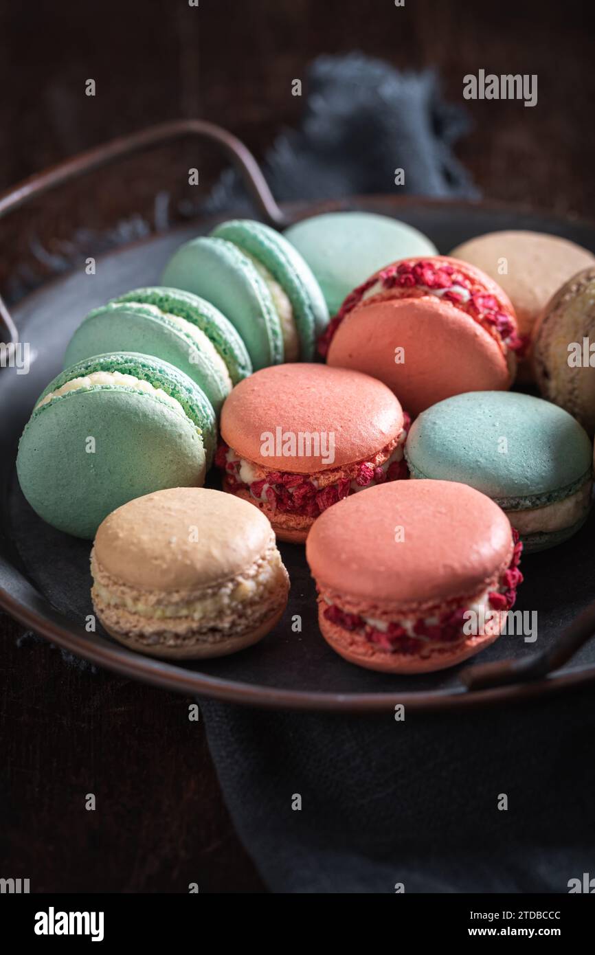 Colorful and tasty macaroons made of creams and meringues. Colorful ...