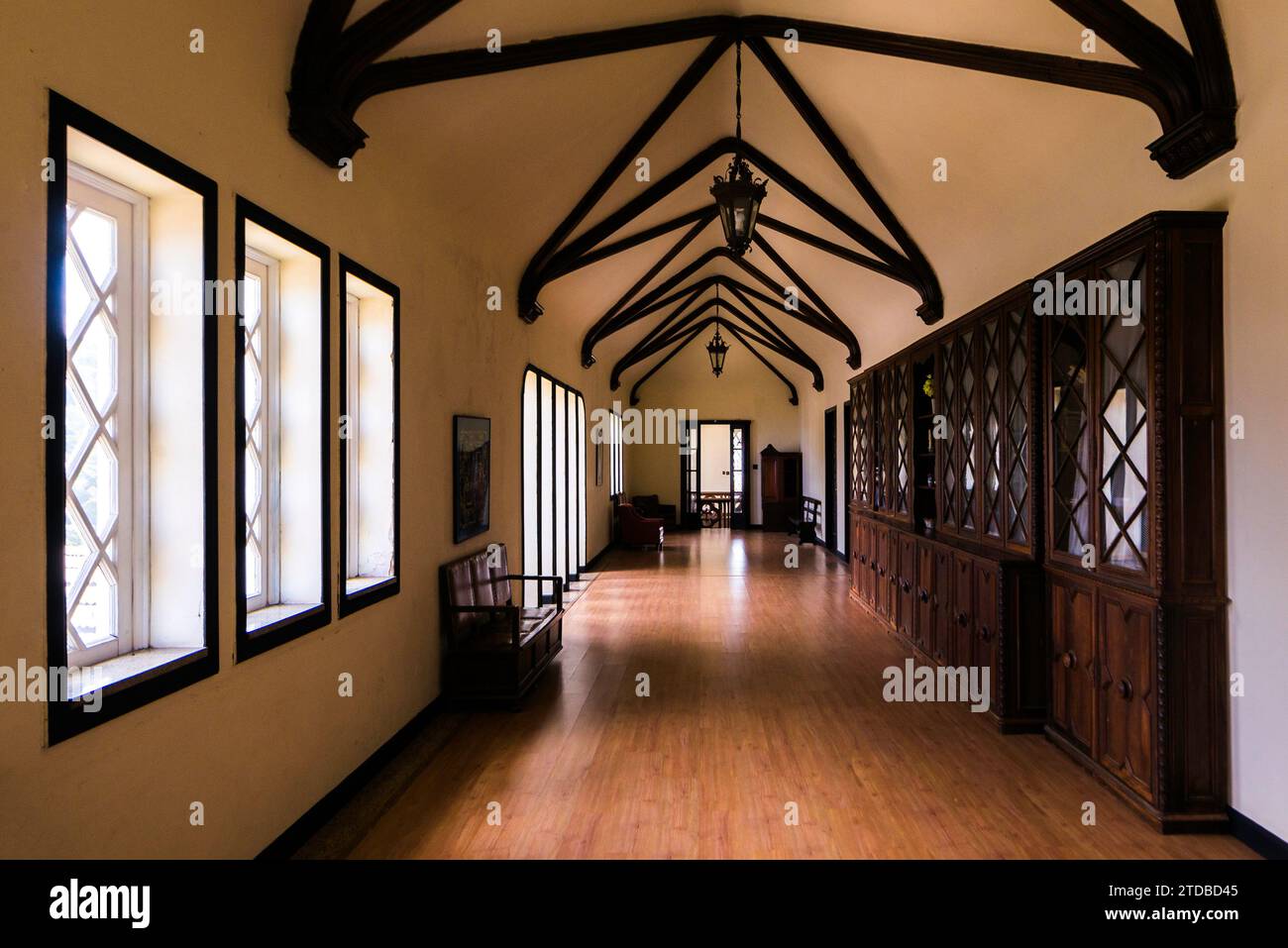 Medieval Corridor With Windows on the Left at Wooden Furniture on the ...