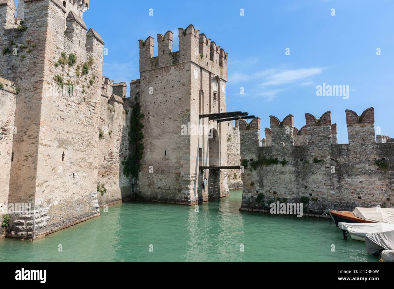 Green water of moat around medieval Italian castle, Green water of moat ...