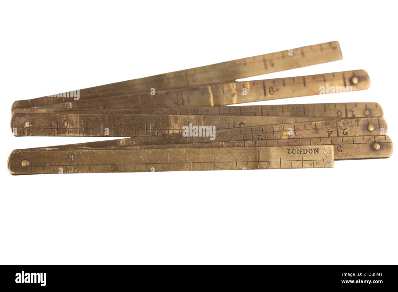 Antique carpenter's brass ruler from isolated on white background Stock ...