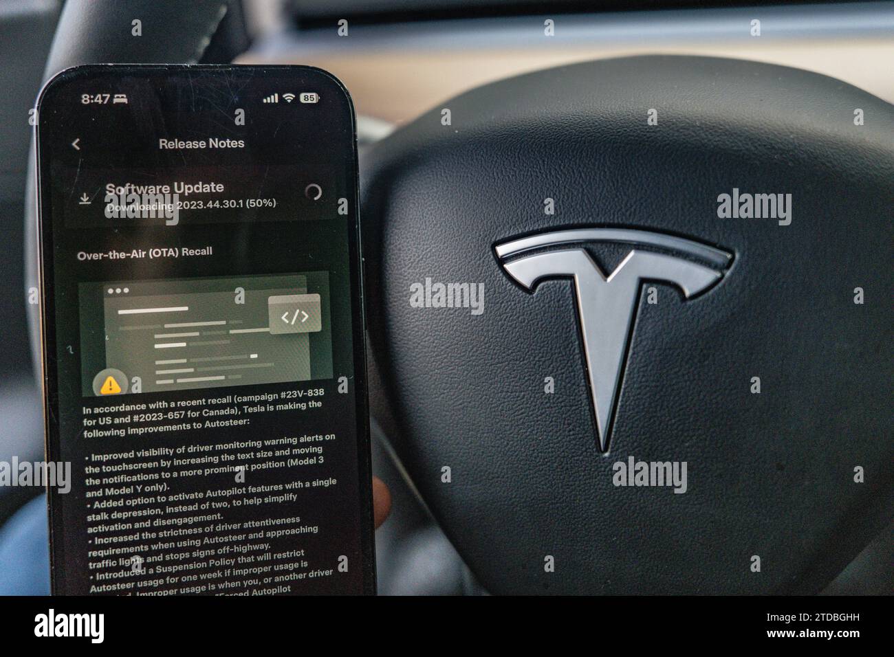 View of autosteer menu on a mobile phone screen, Tesla is recalling ...
