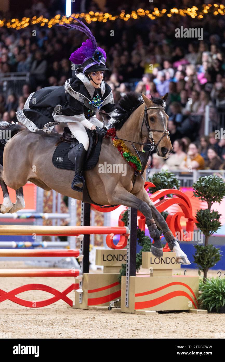 London, UK. December 17, 2023. Tim Gredley and Lily Attwood dressed as ...