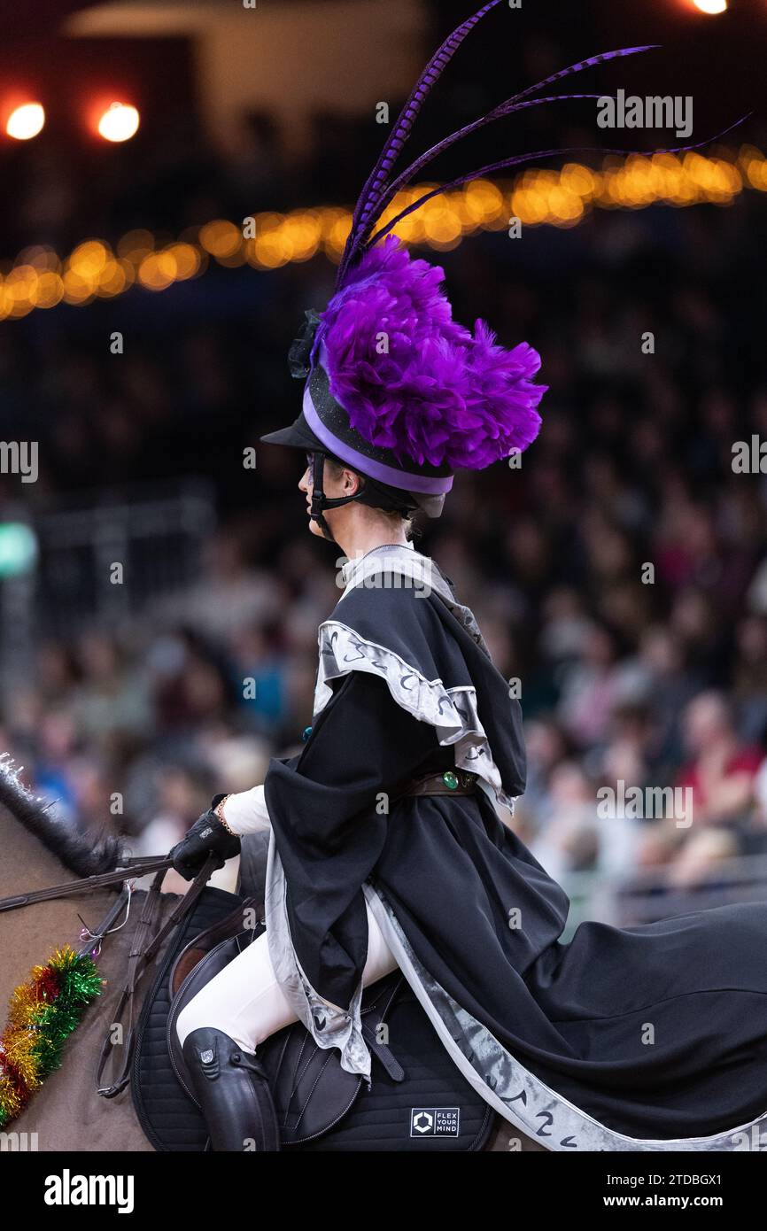 London, UK. December 17, 2023. Tim Gredley and Lily Attwood dressed as ...