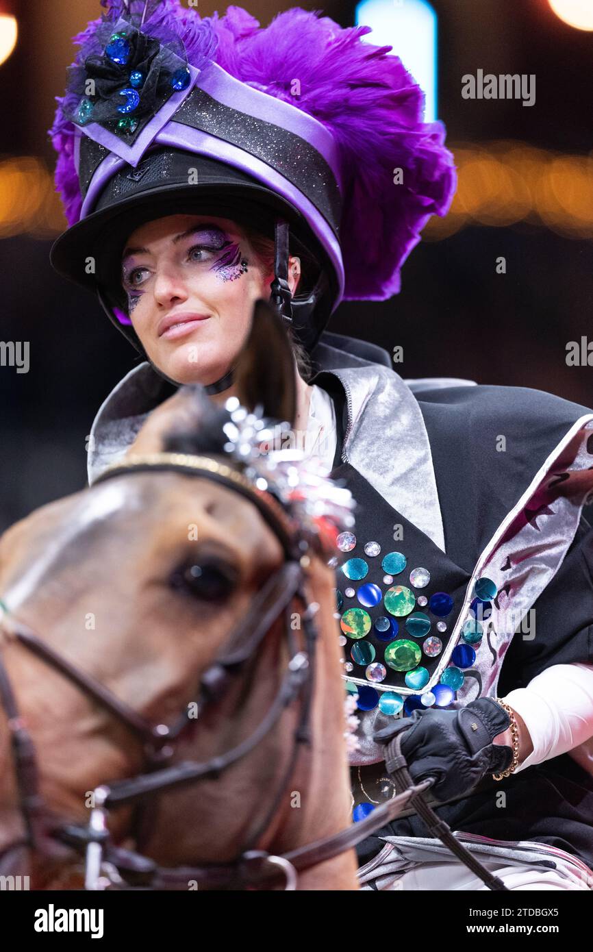 London, UK. December 17, 2023. Tim Gredley and Lily Attwood dressed as ...