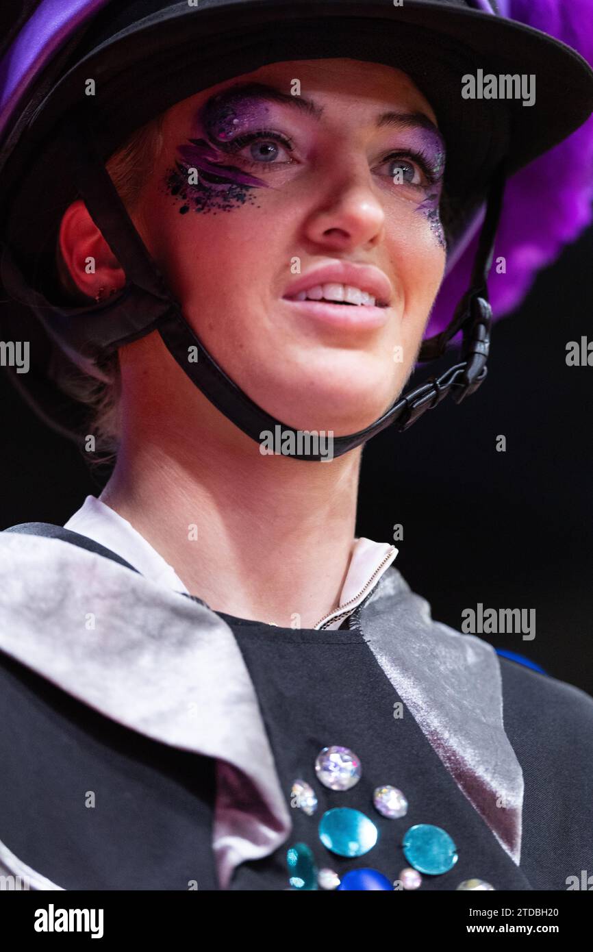 London, UK. December 17, 2023. Tim Gredley and Lily Attwood dressed as ...