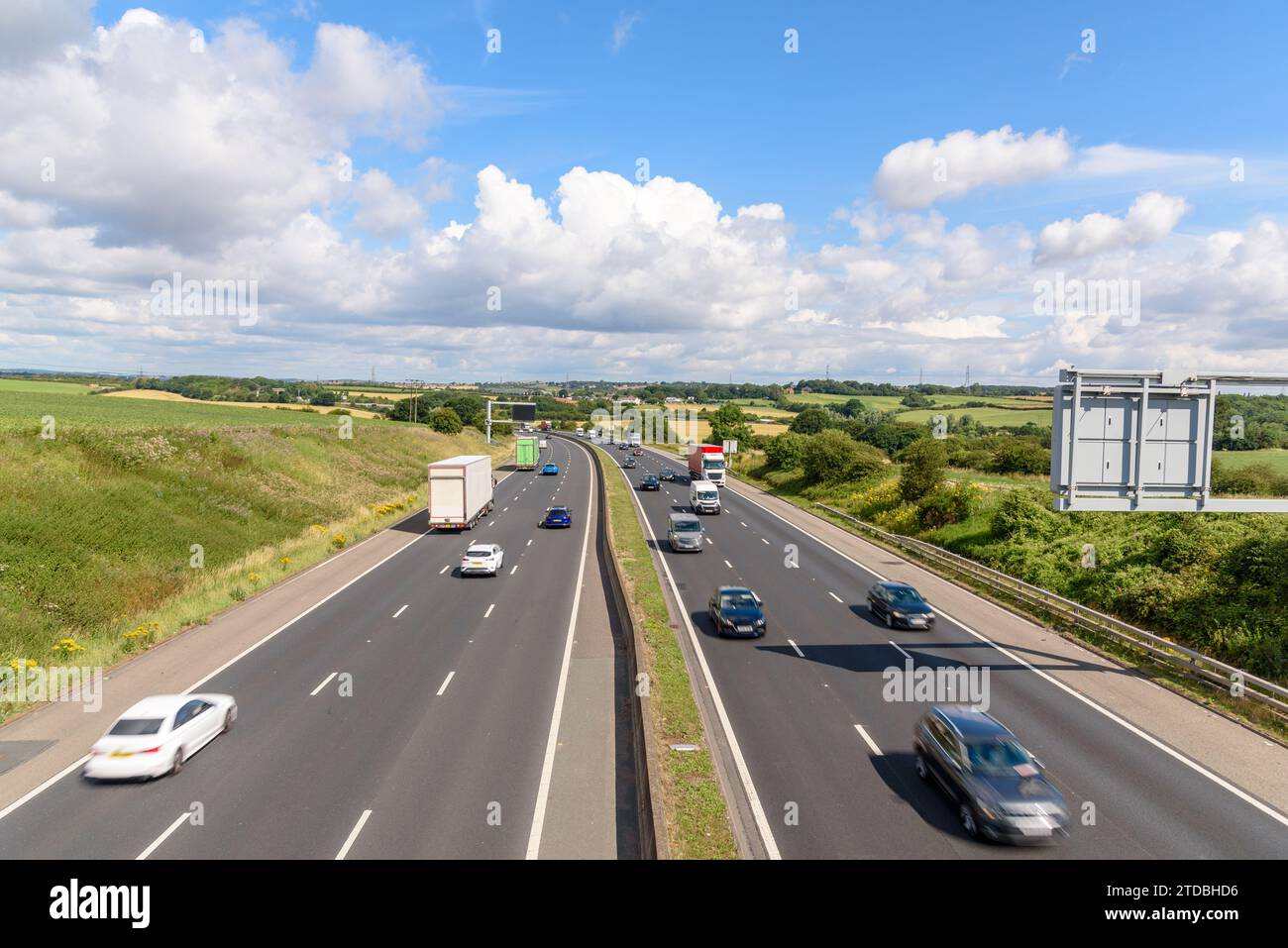 Tree sunlight truck grass motorway transport hi-res stock photography ...
