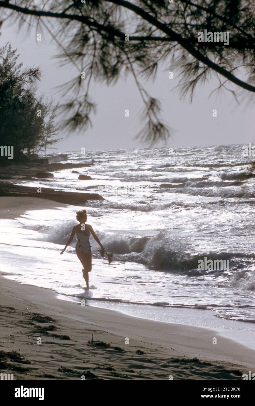 NASSAU, BAHAMAS - APRIL 19: Model Shirley Foskitt runs on Love Beach ...