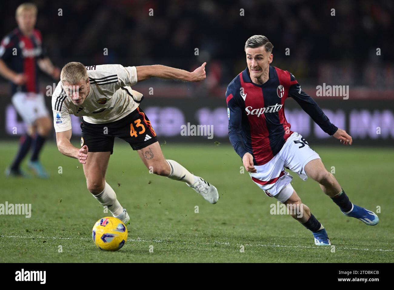 Bologna, Italy. 17 December, 2023. Rasmus Kristensen (Roma) Alexis ...