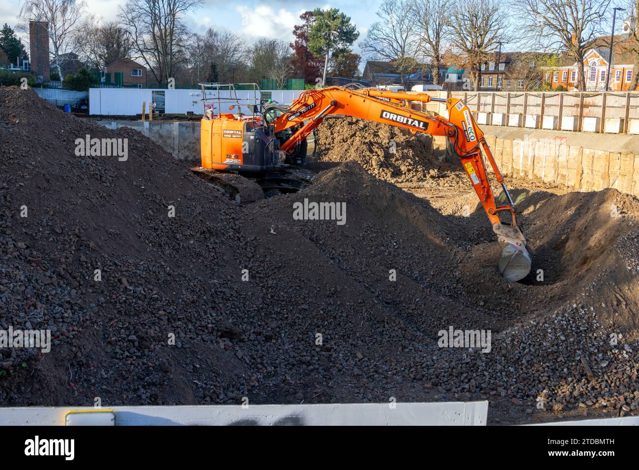 digger working on new housing development Stock Photo - Alamy