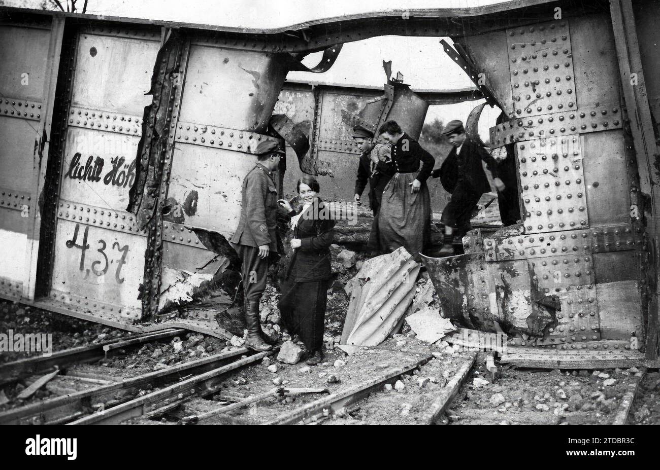 November 1918. In the liberated regions. A Canadian soldier helping a ...