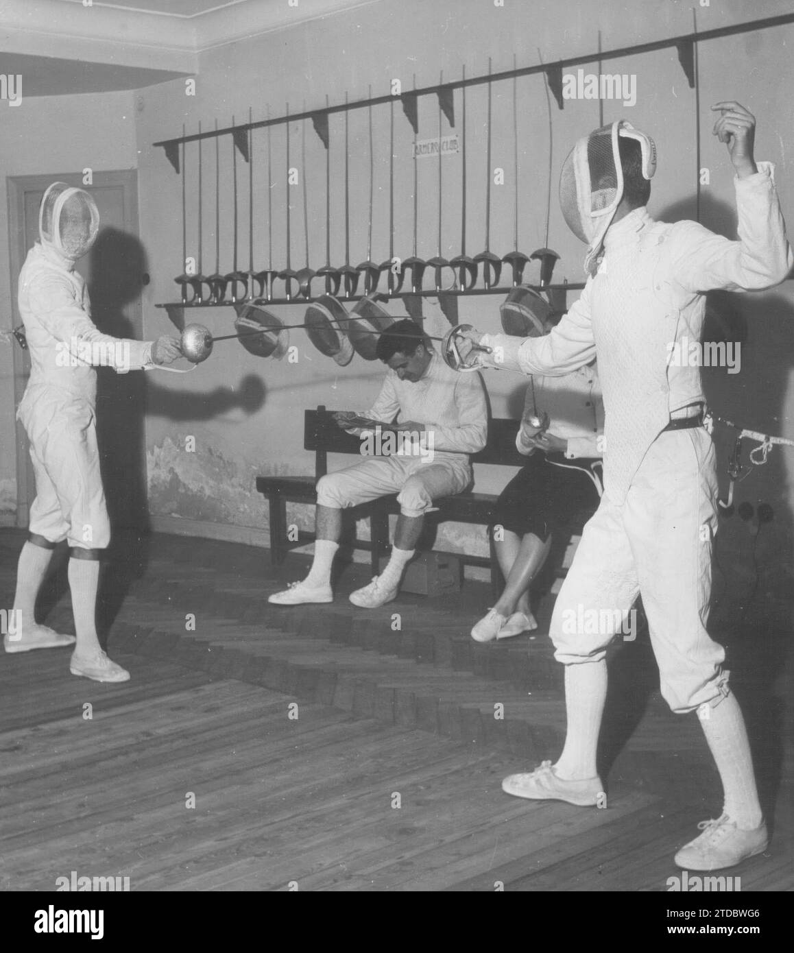 12/31/1956. Guard blow A Sword. Behind the first shooter's back, the ...