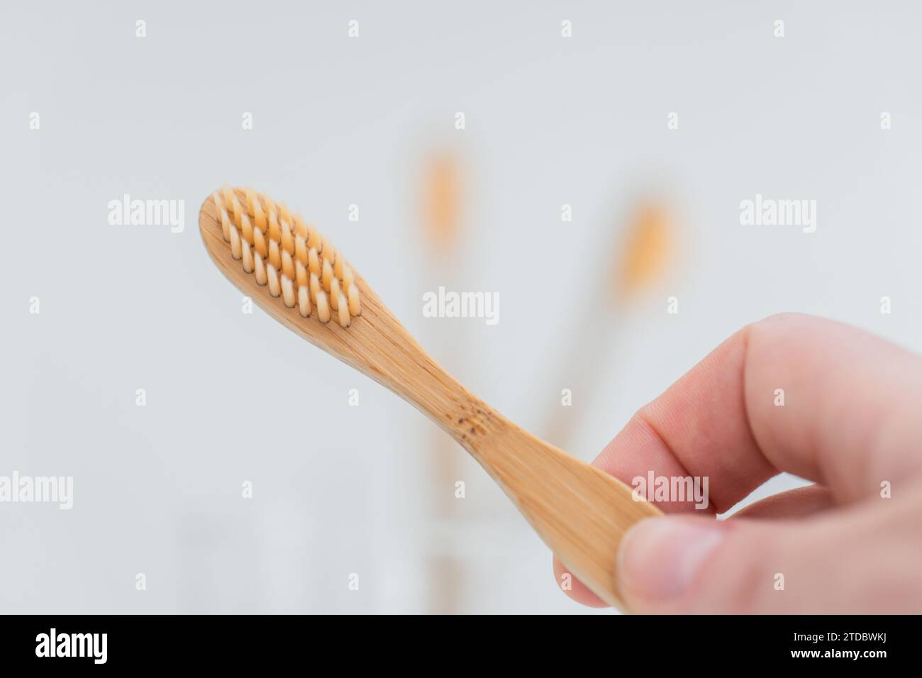 bamboo toothbrush.Teeth cleaning.Toothbrush with toothpaste in hand ...