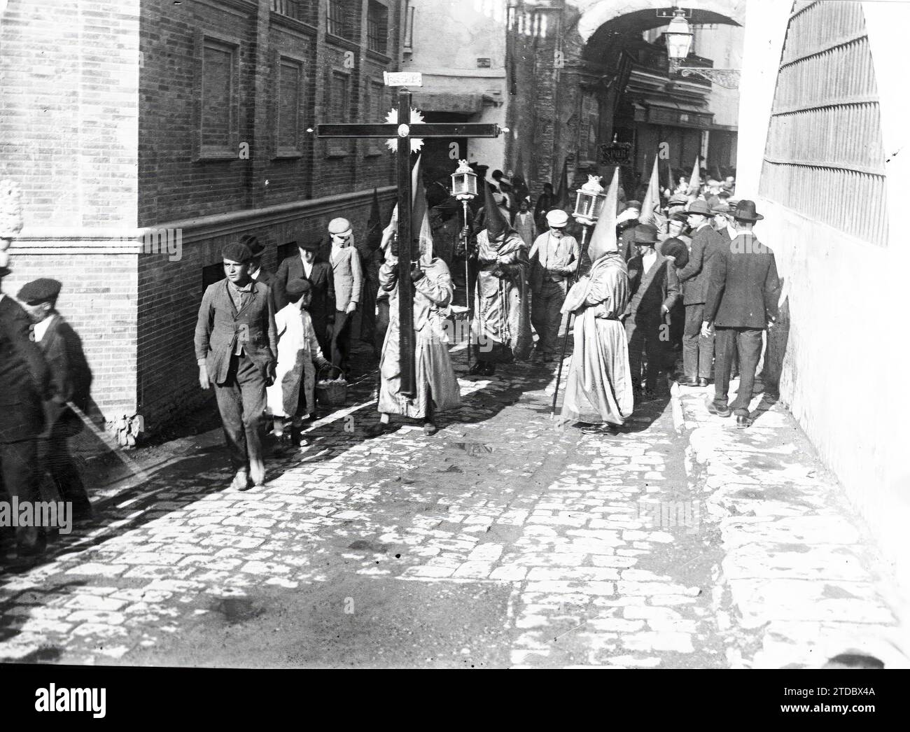 Seville. March 1929. The guiding cross of the Cigarreras brotherhood ...
