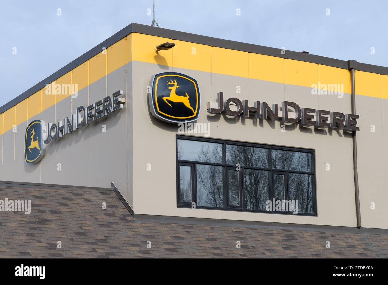 Kent, WA, USA - February 12, 2023; Sign and logo on building for John ...