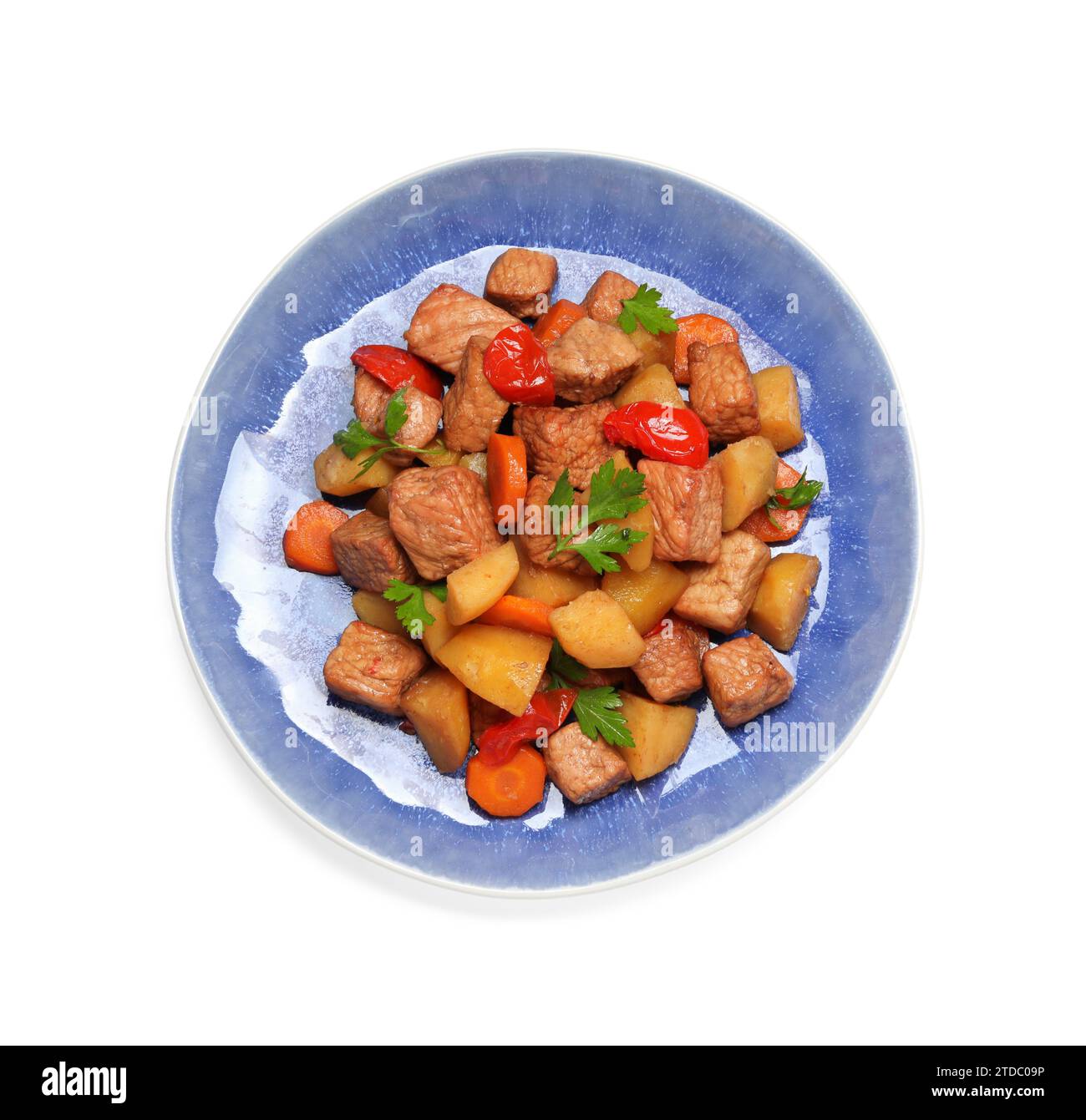 Plate with delicious goulash isolated on white, top view Stock Photo ...
