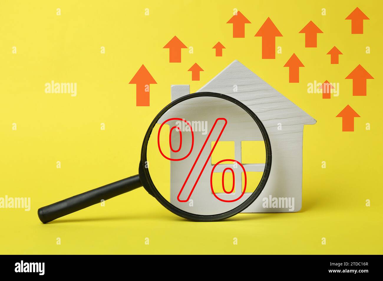 Mortgage rate rising illustrated by upward arrows and percent sign ...