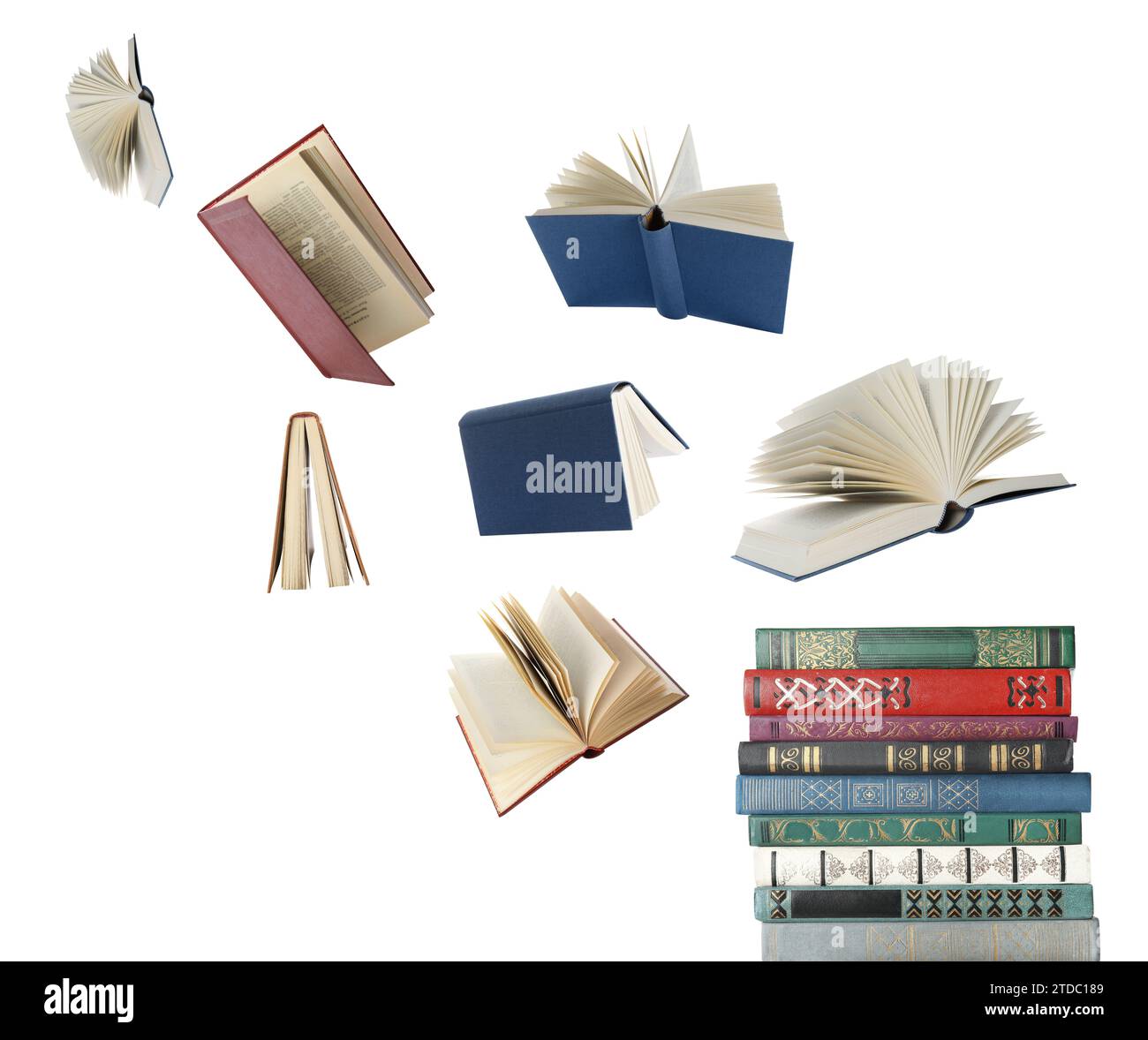 Books flying over stack on white background Stock Photo - Alamy