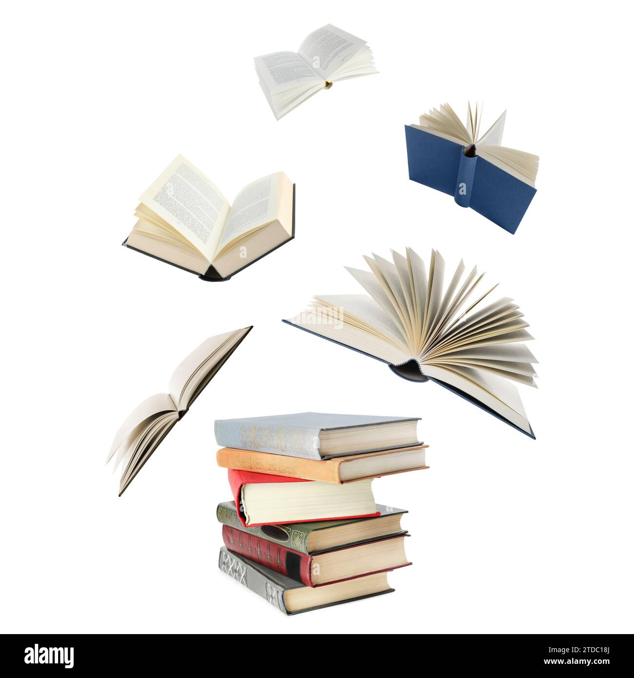 Books flying over stack on white background Stock Photo - Alamy