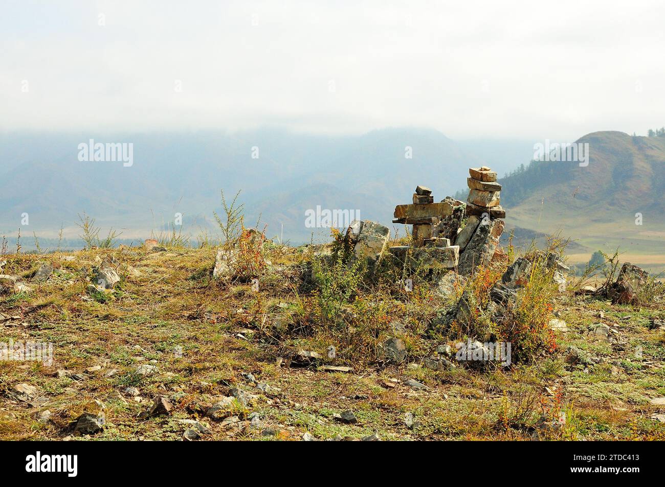 Ritual stone pyramids on top of a hill overlooking a beautiful valley ...