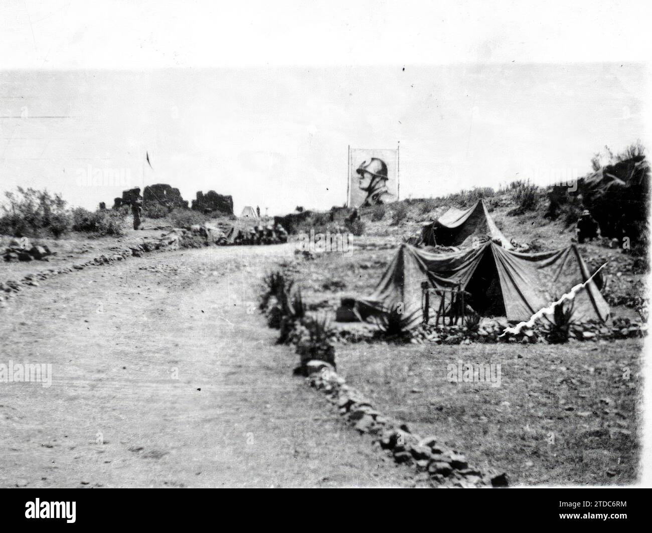 09/30/1935. A gigantic sign with the effigy of Mussolini, raised in ...