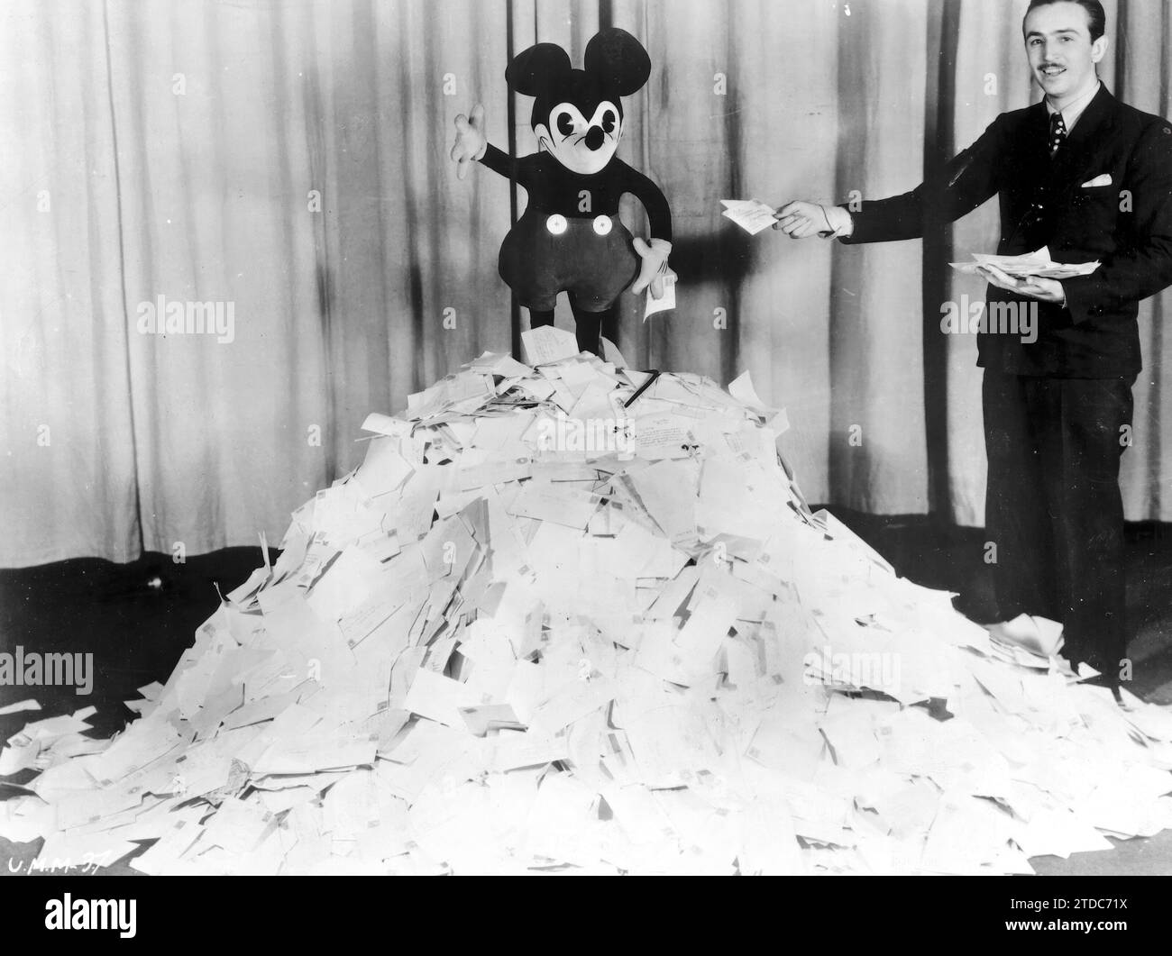 12/31/1929. Walt Disney smiles next to his great creation, Mikey Mouse ...