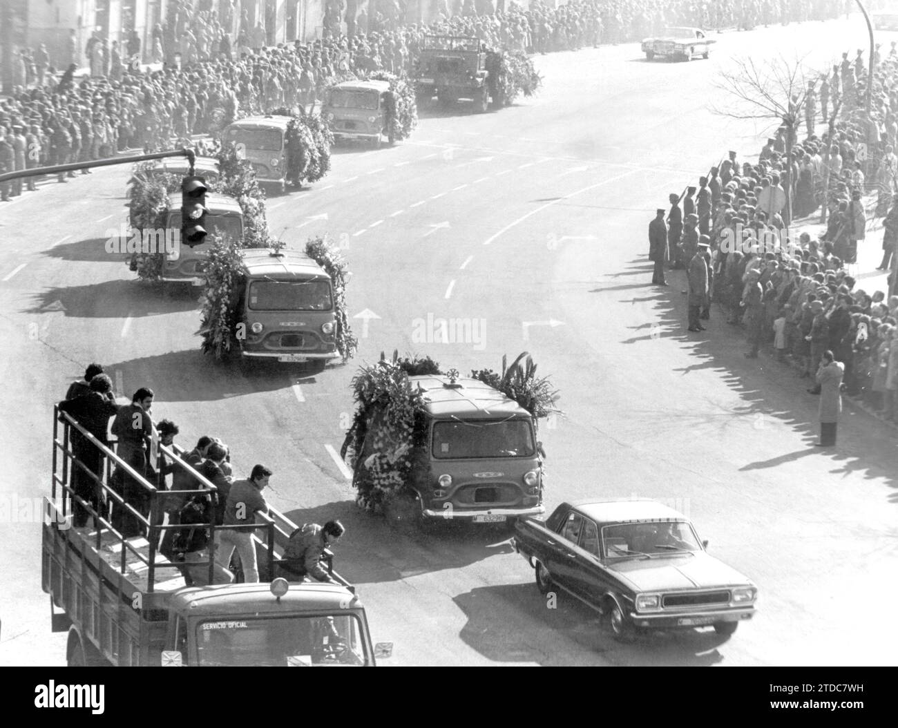 11/22/1975. Wreaths of flowers accompany the funeral procession of the ...