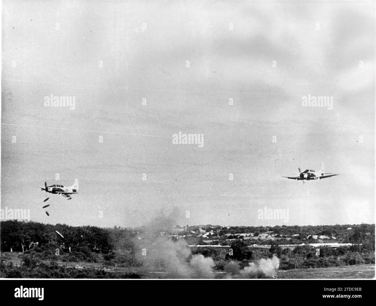 10/13/1964. American Skyraiders and 1 planes bomb areas occupied by ...