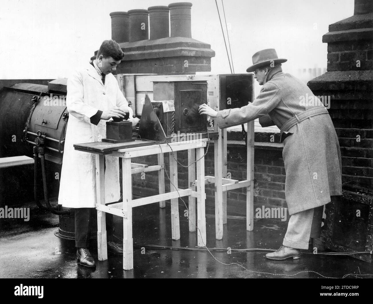 01/01/1927. Mr Baird working with the "Noctovisor" on the roof of 2 TV ...