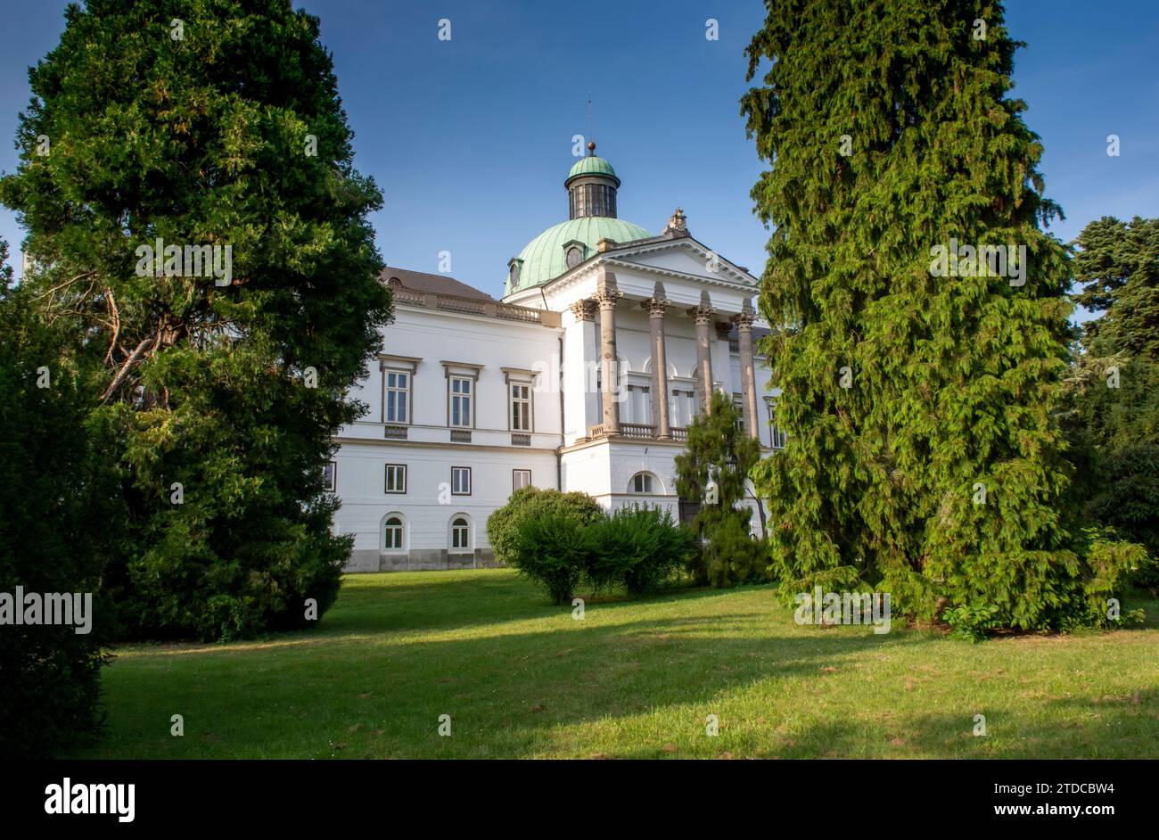 Classicist-style manor house and castle in Topolcianky park. Slovakia ...