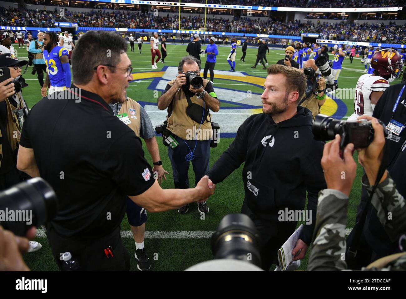 Inglewood, United States. 17th Dec, 2023. Rams head coach Sean McVay (R ...