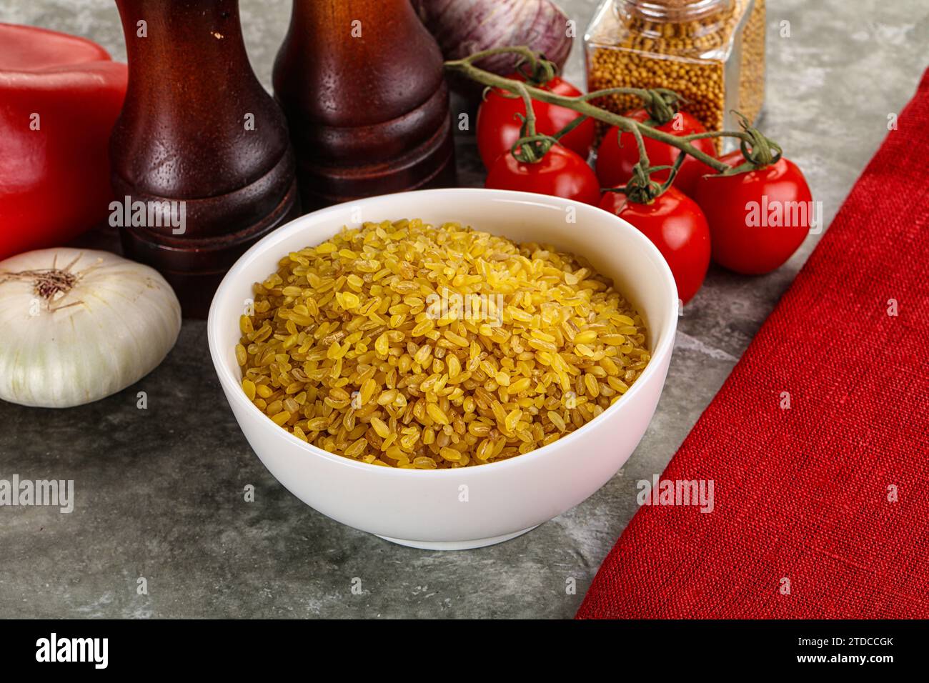 Dry wheat bulgur cereal heap for cooking Stock Photo - Alamy