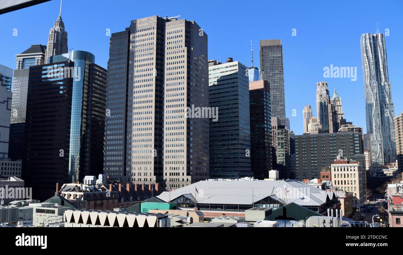 The roof of Fulton market building with Frank Gehry's tower lower ...