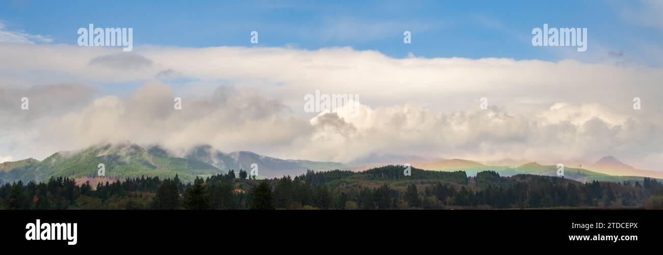 Overarching rainbow hi-res stock photography and images - Alamy